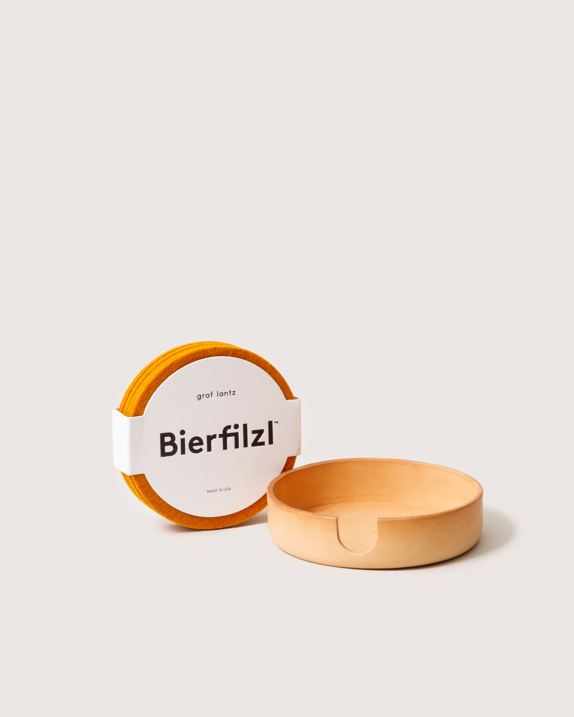 Round Kobon Leather Tray with Merino Wool 4 Pack Coaster in Turmeric | Graf Lantz